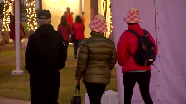 Residents, visitors bundle up and head out amid cold snap; parts of ...