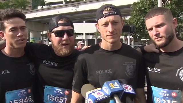 Runners pay tribute to slain MDPD officer as Miami Marathon and Half ...