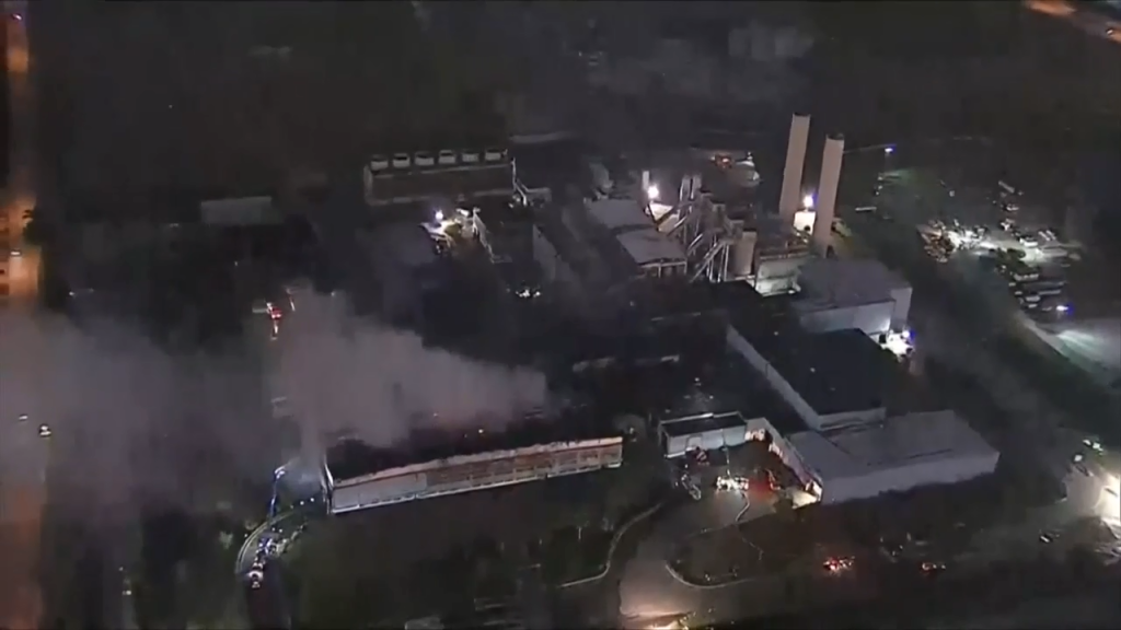 Trash plant in Doral continues to smolder as fire crews work to quell ...