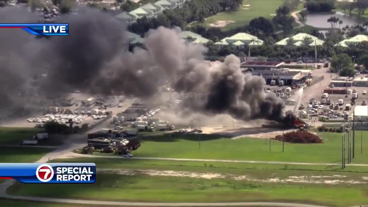 Crews fight massive flames after trash pile catches fire in West Miami ...