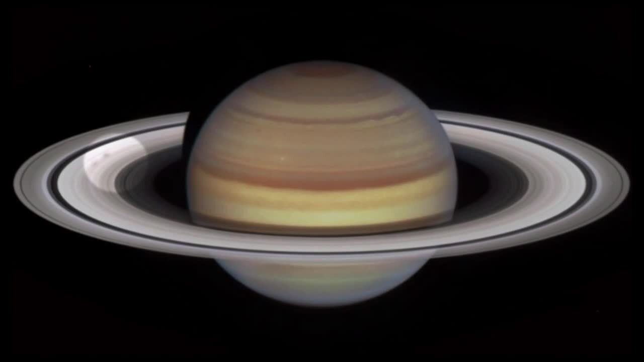 Hubble captures mysterious ‘spokes’ gliding across Saturn’s rings ...