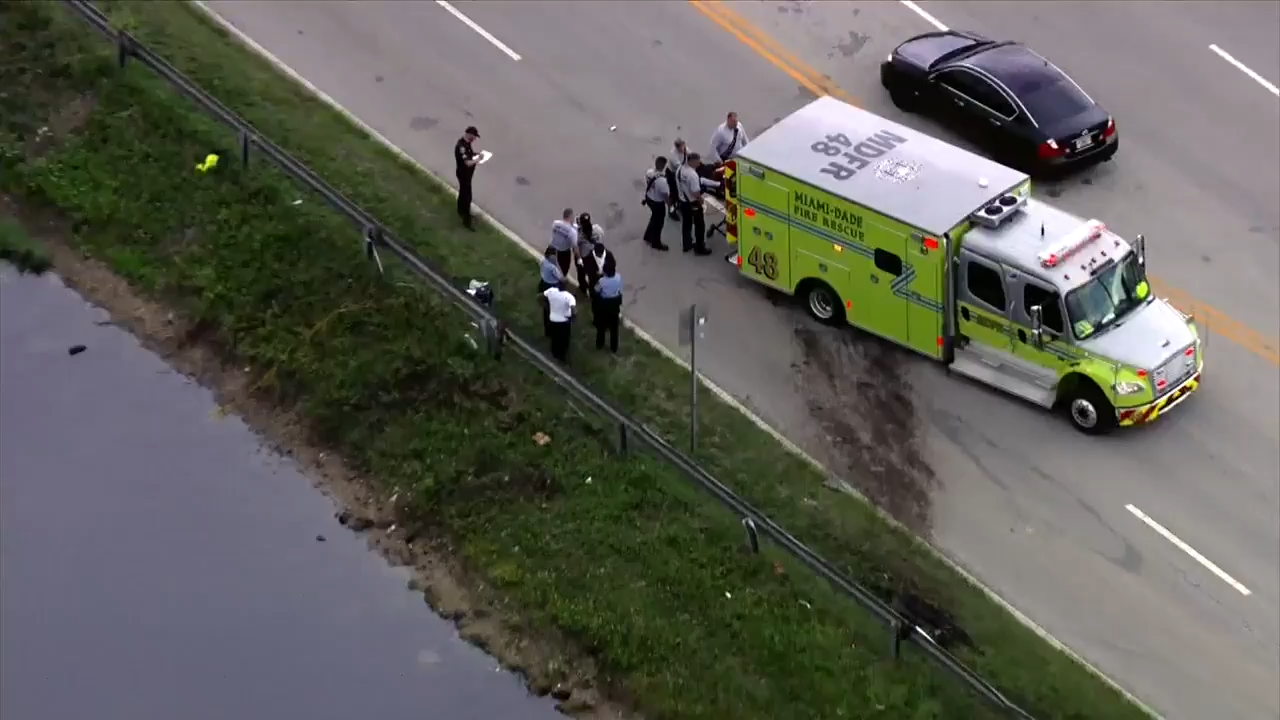 Vehicle goes into canal near Doral following 2-car crash; driver ...