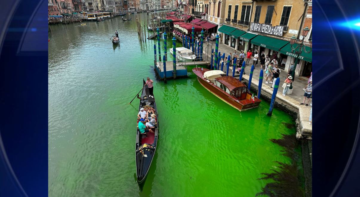 Venice authorities investigate after canal turns fluorescent green ...