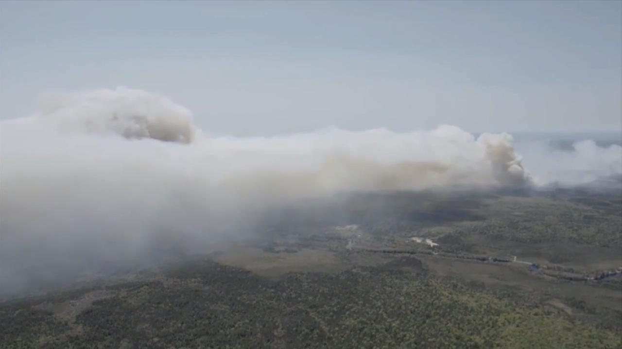 Wildfire in Canadian province contained, while another burns out of ...
