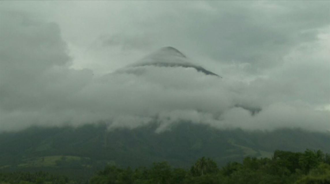Philippine villagers flee ashfall, sight of red-hot lava from erupting ...