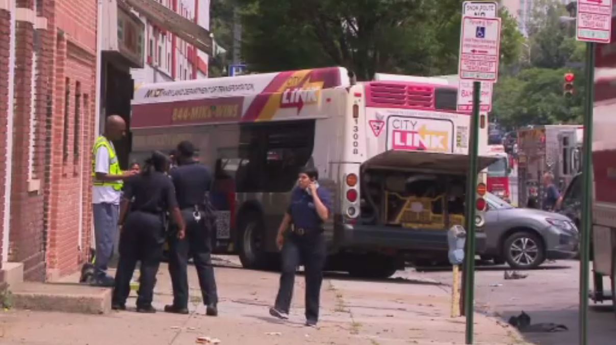 16 injured as Baltimore bus crashes into 2 cars, apartment building ...