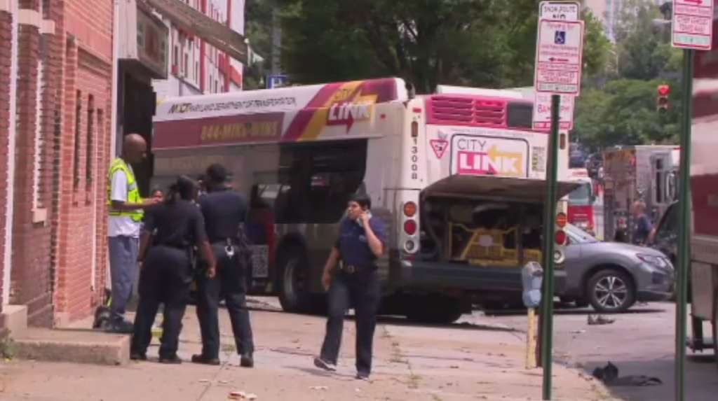 16 injured as Baltimore bus crashes into 2 cars, apartment building ...