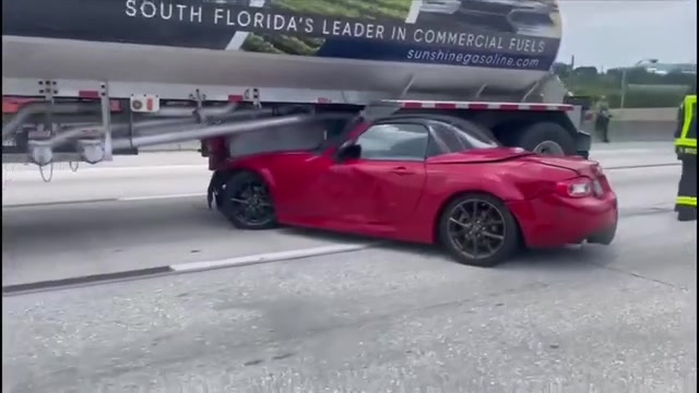 Miata ends up wedged under fuel tanker on I-95 in Miami, causing lane ...