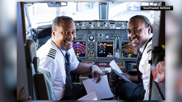 A kid posed with his pilot dad in an airplane. Almost 30 years later ...