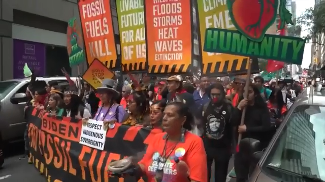 Tens of thousands march to kick off climate summit, demanding end to ...