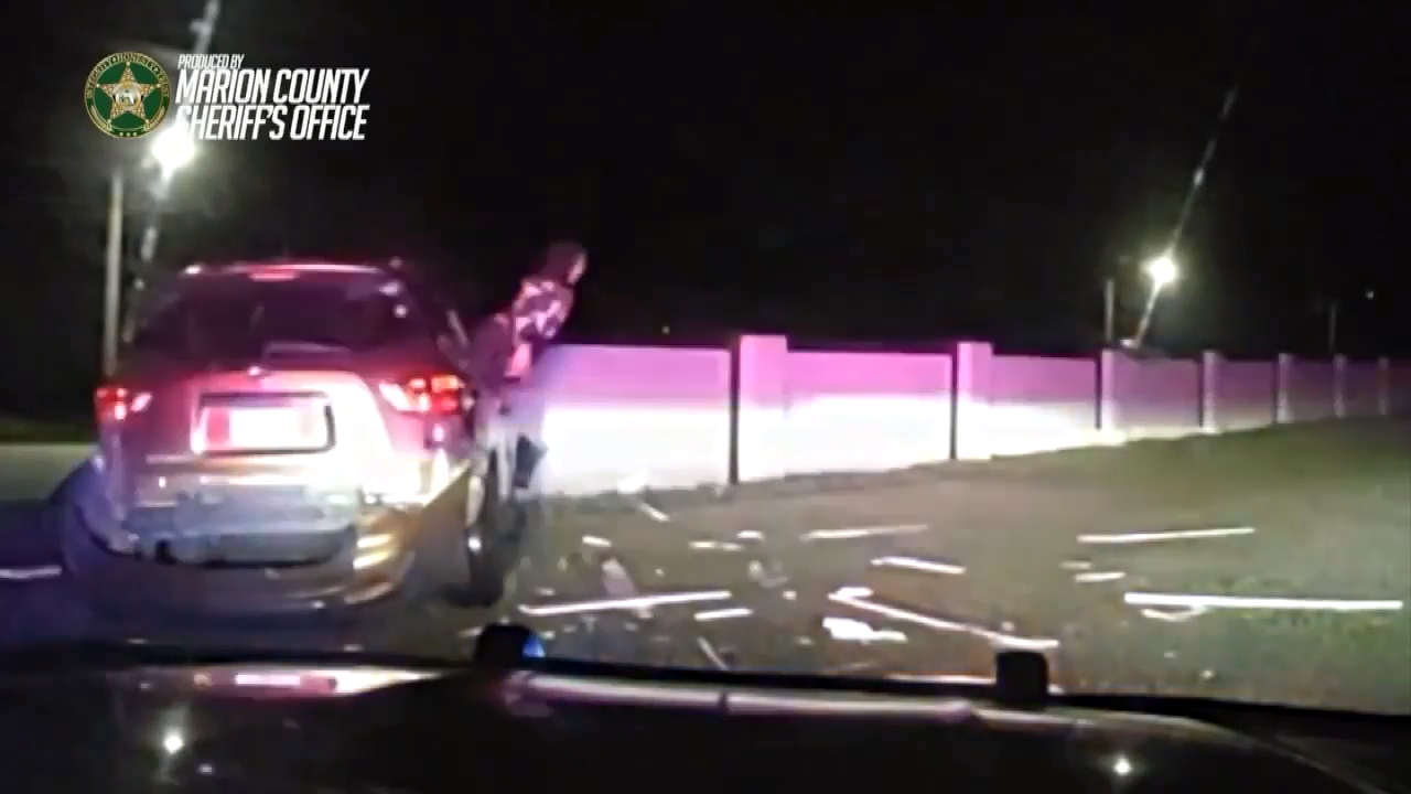 Dashcam video shows reckless driver head-butting car window following ...