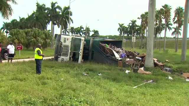 Garbage truck driver OK after rollover crash on Turnpike exit ramp in SW Miami-Dade - WSVN 7News ...