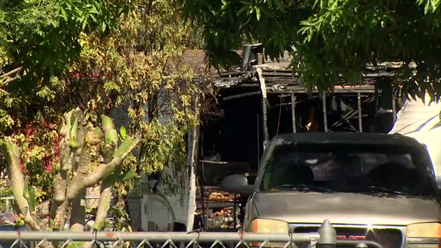 1 hospitalized after trailer behind Homestead home catches fire - WSVN ...