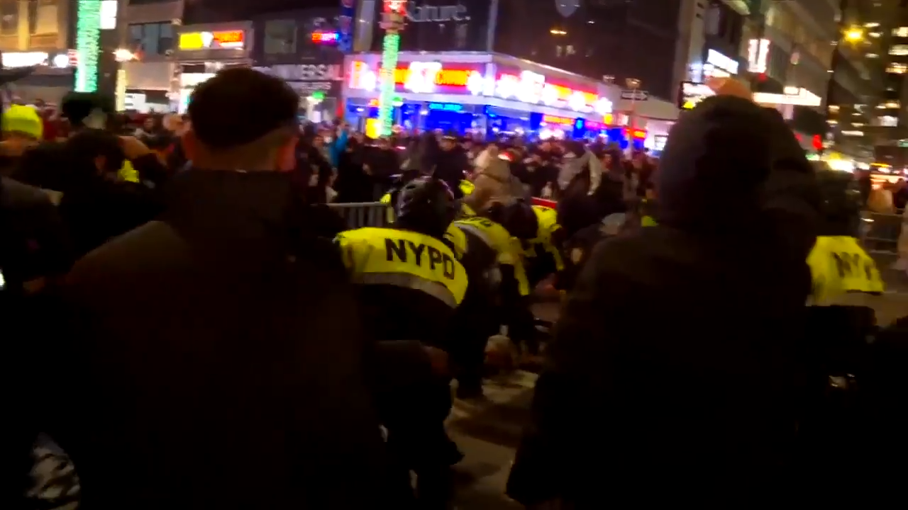 Iconic Christmas tree at Rockefeller Center illuminated in midst of pro ...