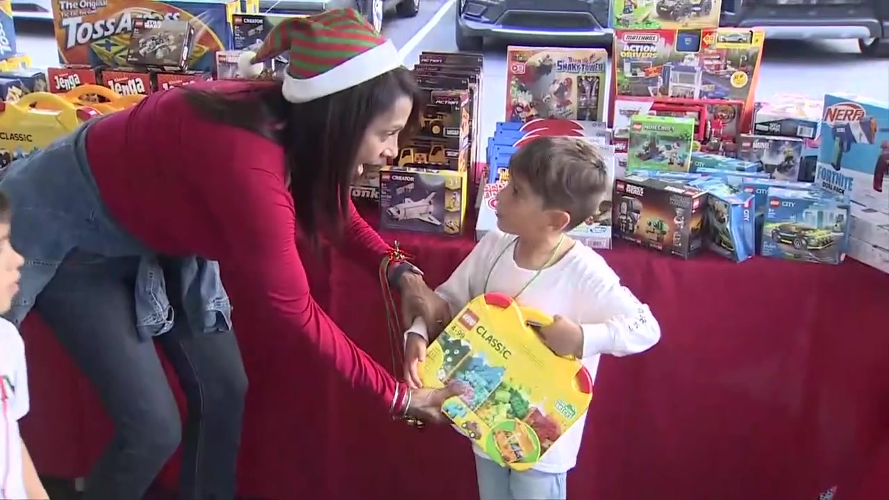 South Florida dealership spreads holiday cheer with annual toy giveaway for over 700 kids - WSVN ...