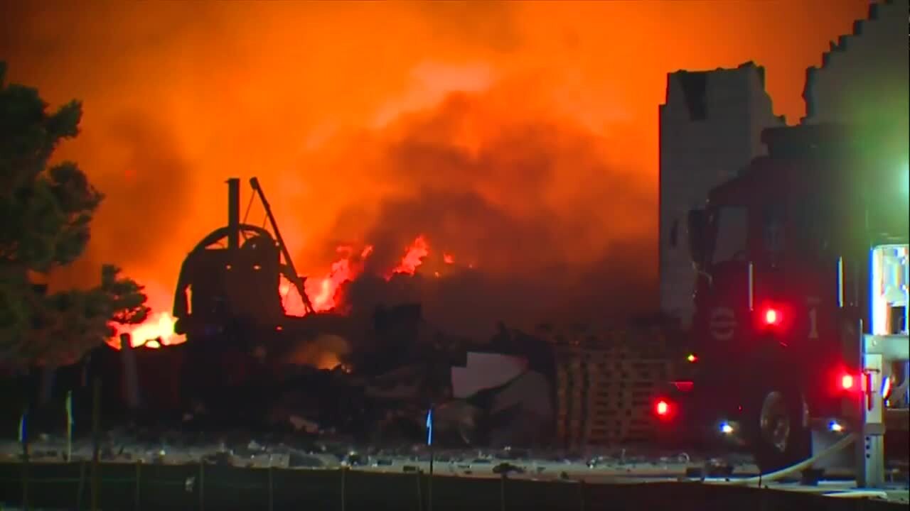Industrial fire and multiple explosions shoot debris into the air in ...
