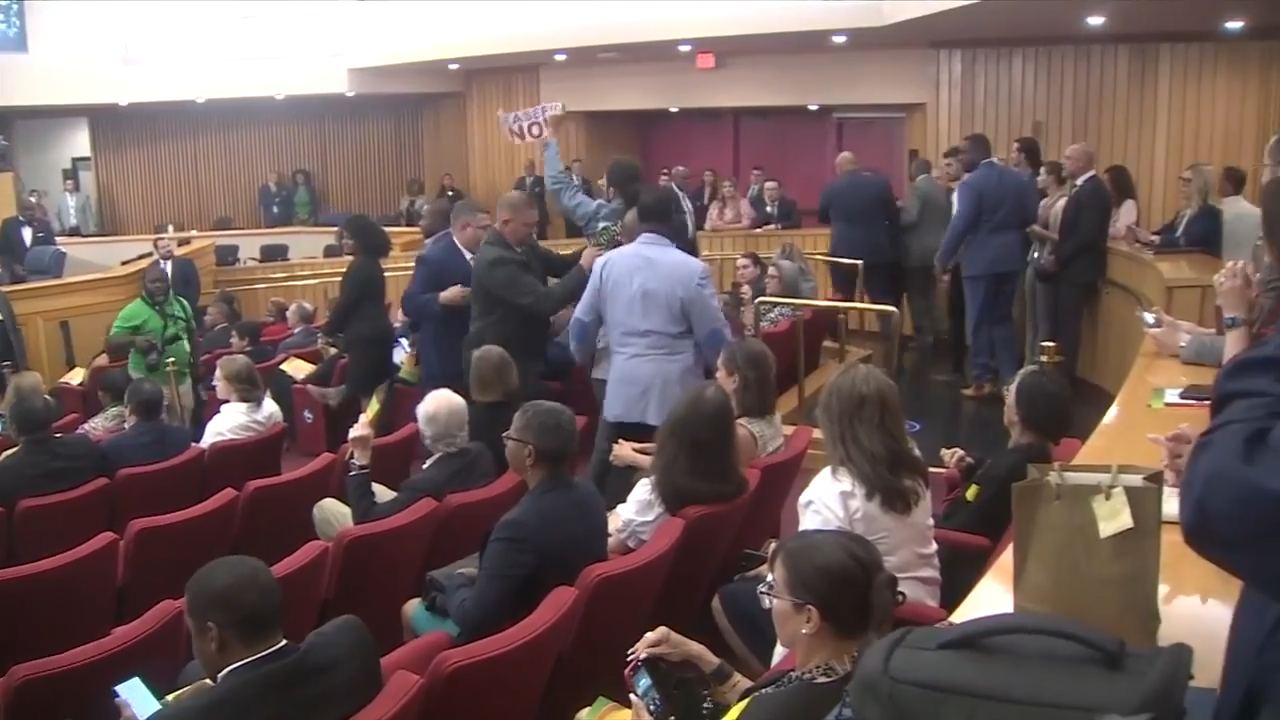 Protesters interrupt induction ceremony for the Miami-Dade Women’s Hall ...