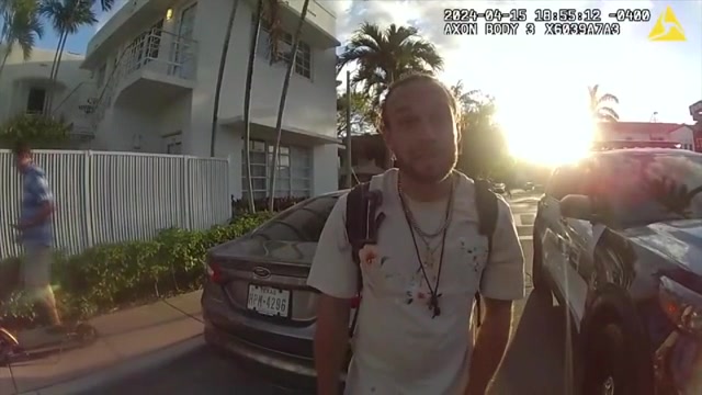 Bodycam video shows arrest of man accused of pointing gun at Miami ...