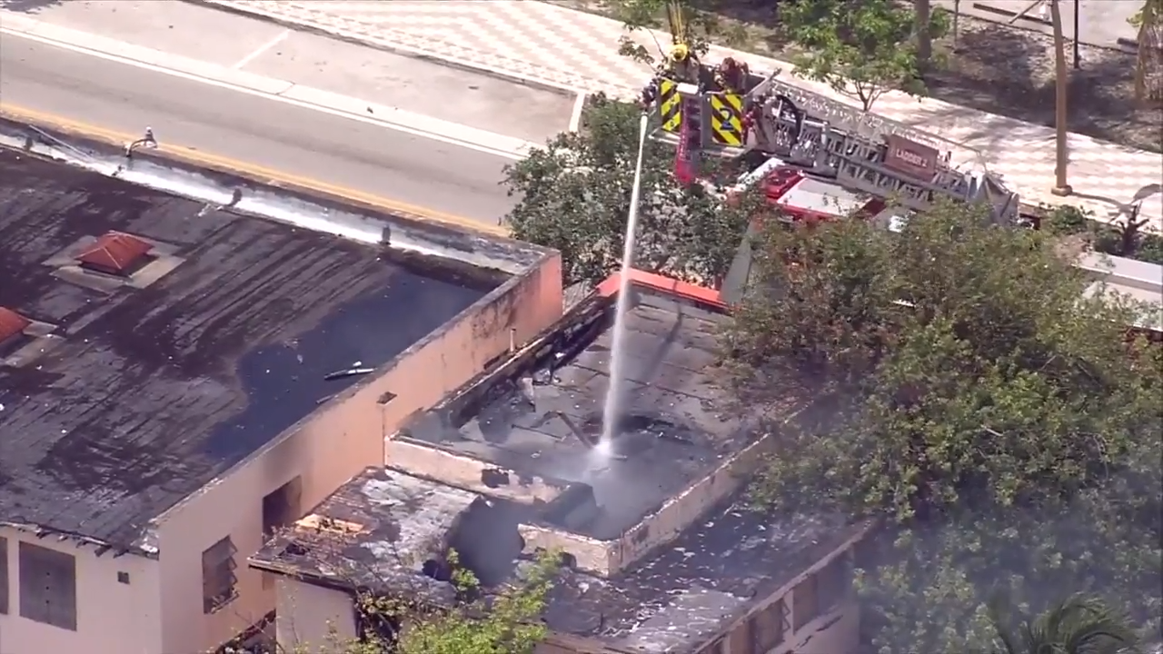 Firefighters Work To Extinguish Abandoned Building Fire In Fort