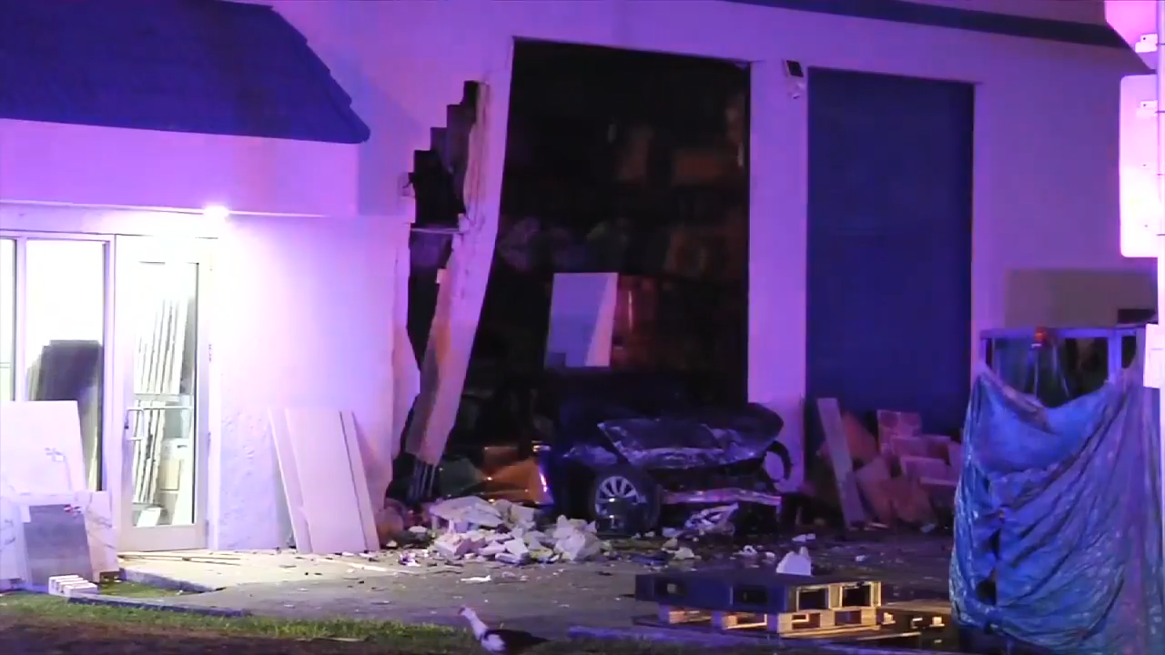 Vehicle crashes into flooring depot in Hollywood; driver in critical ...