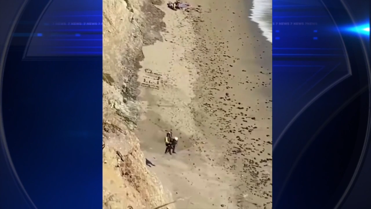 Stranded kite surfer’s “HELP” message on beach leads to rescue - WSVN ...