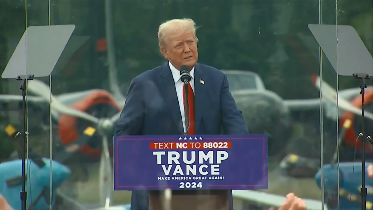 Trump speaks from behind bulletproof glass at first outdoor rally since ...
