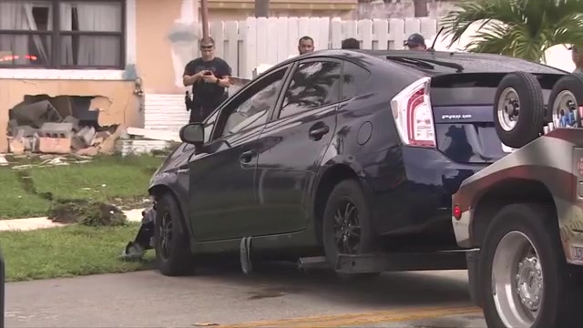 Prius slams into Fort Lauderdale home, causing gaping hole, burst pipe ...