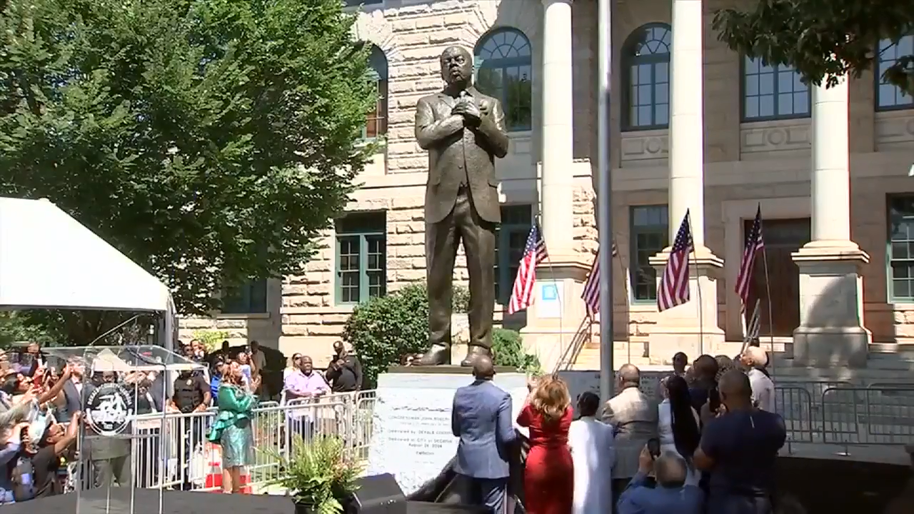 Crowd on hand for unveiling of John Lewis statue at spot where ...