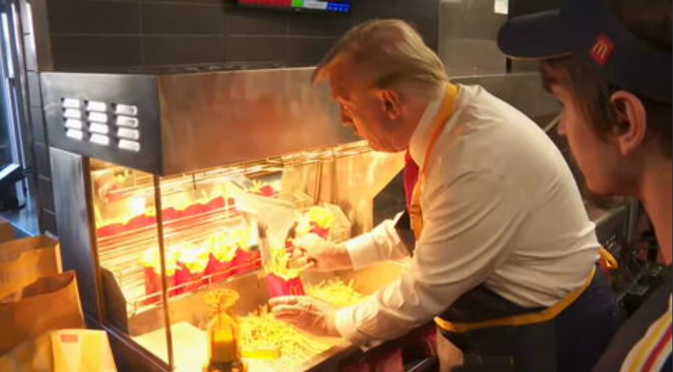 Trump works the fry station and holds a drive-thru news conference at a ...