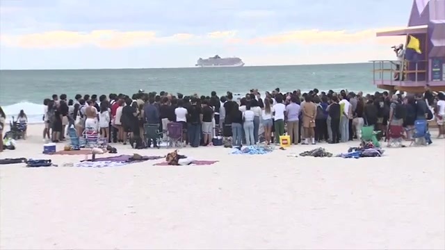 Loved ones gather to remember swimmer found dead after going missing on ...