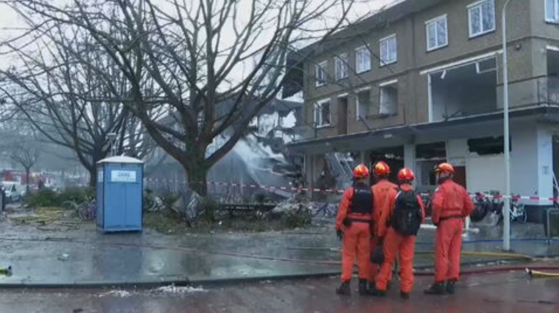 An explosion destroys an apartment block in a Dutch city, killing at ...