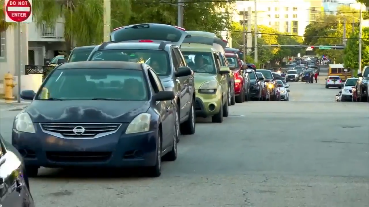 Hundreds of families line up for CAMACOL’s 39th annual holiday meal ...