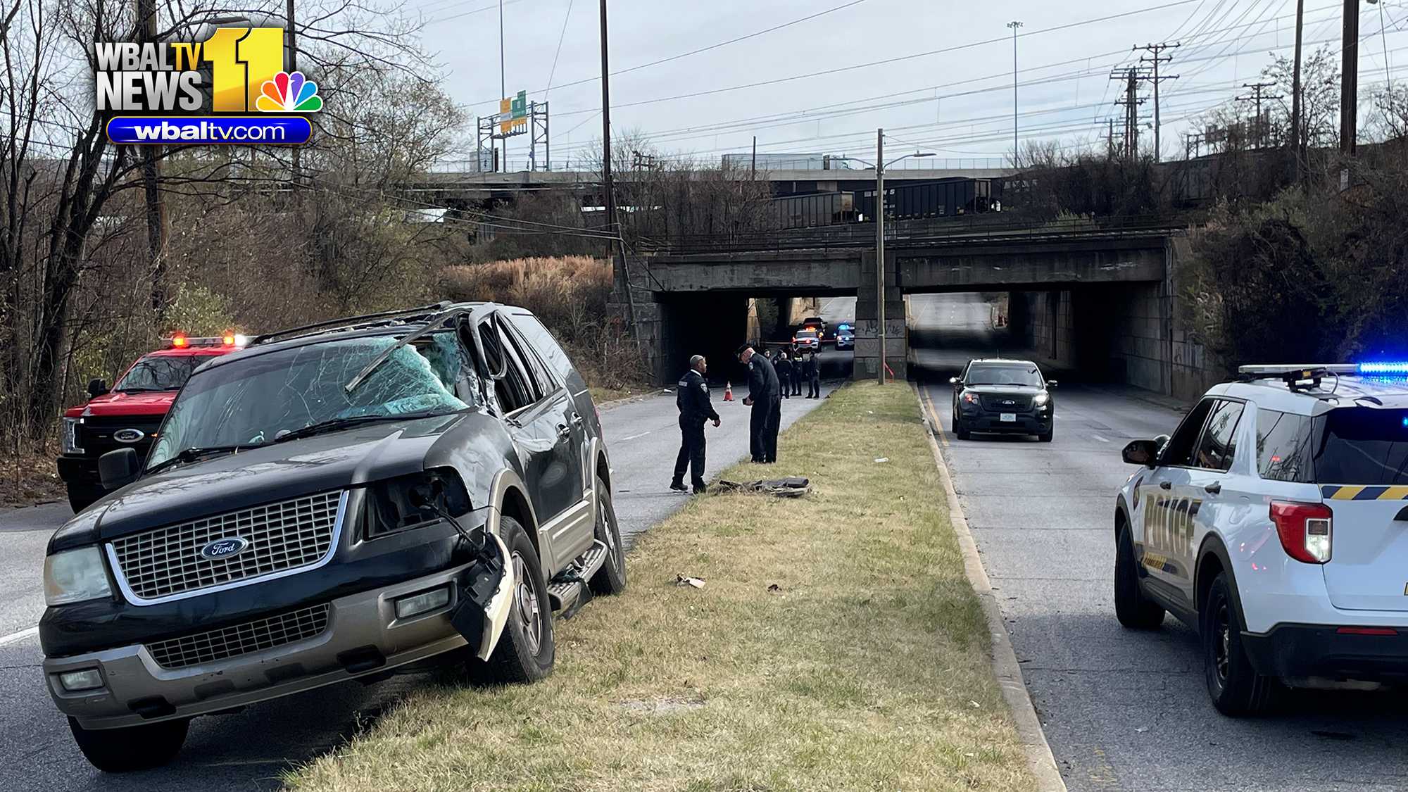 Concrete falls from railroad bridge, hits SUV, injuring driver in ...