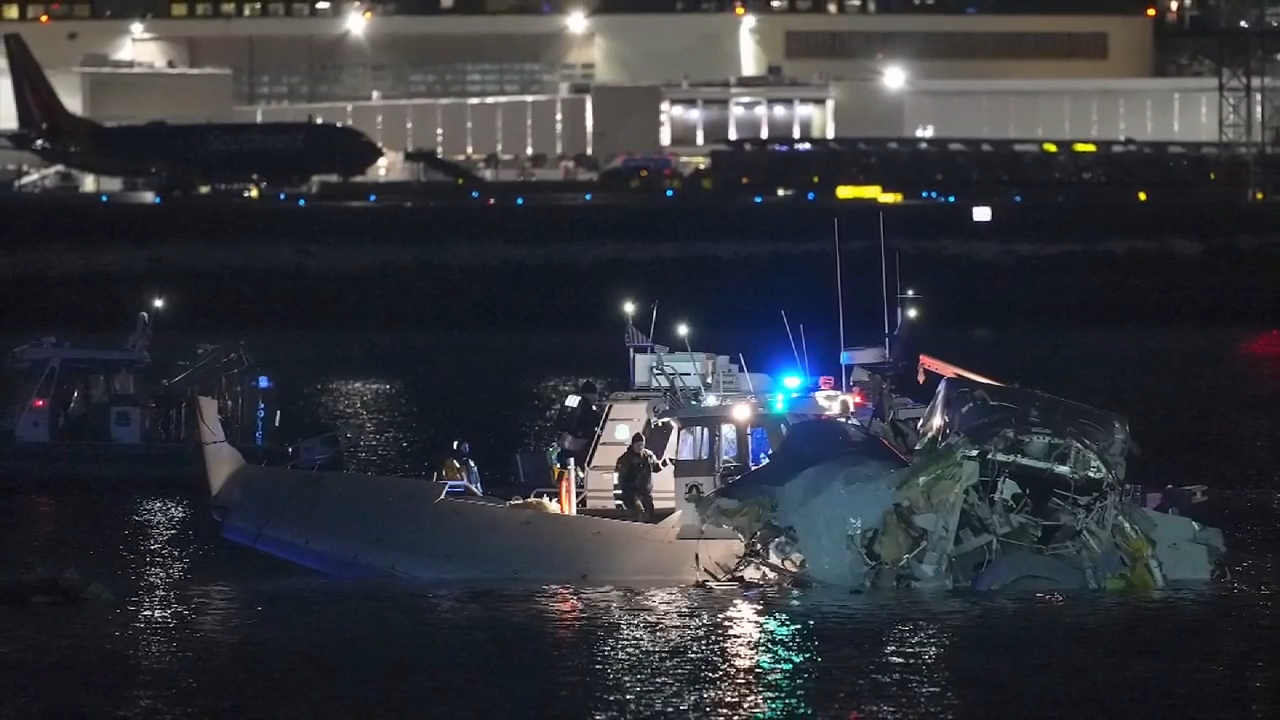 Passenger jet with 64 aboard collides with Army helicopter while landing at Reagan Airport near ...