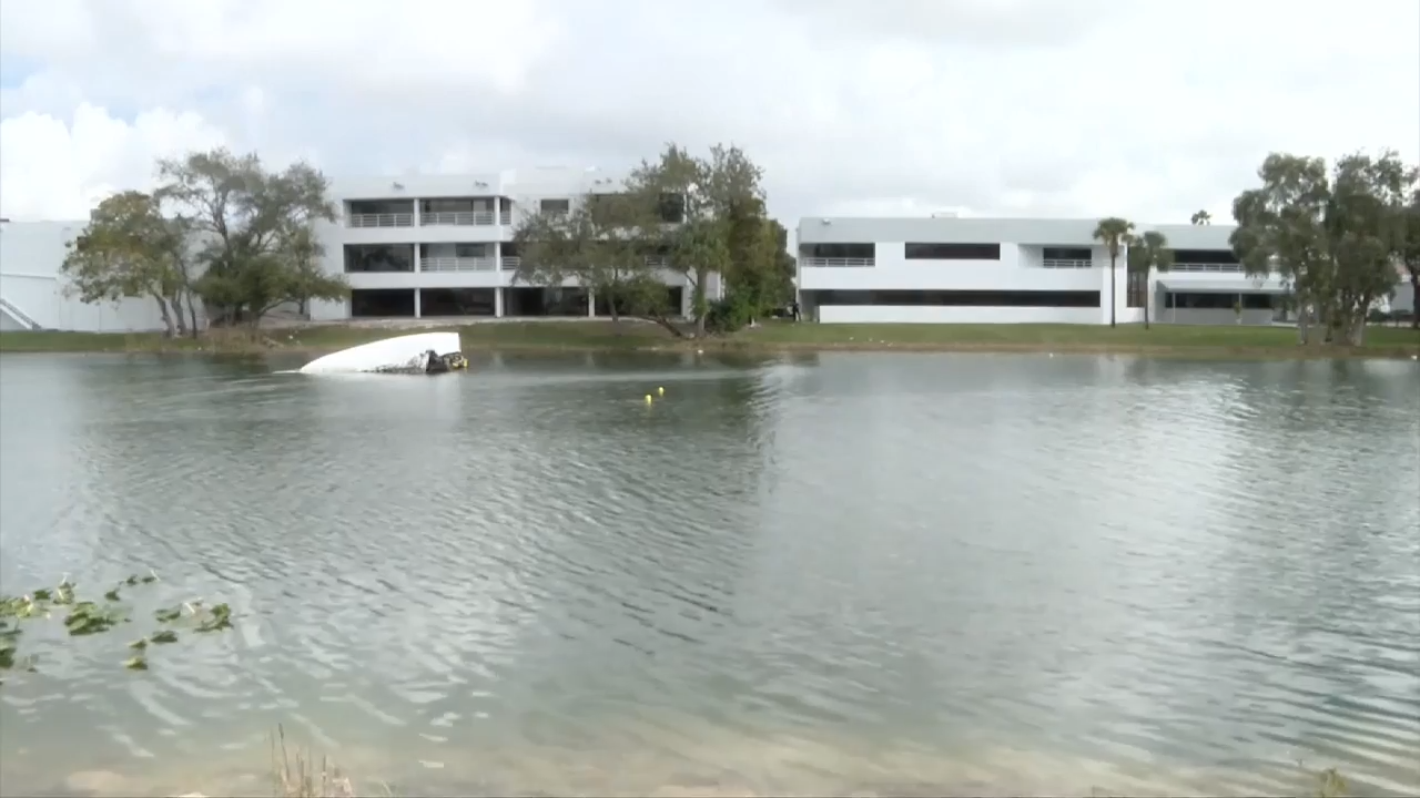 Investigation underway after body found floating in lake in Doral ...