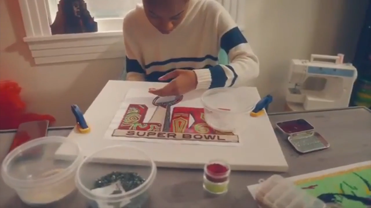 Super Bowl artist weaves Black Masking culture into vibrant logo and ...
