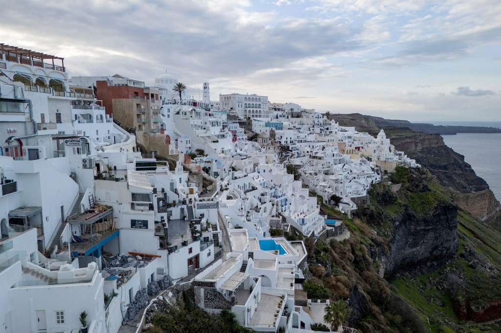 ‘The whole island has emptied:’ Thousands flee Santorini as quakes rattle Greek tourist haven ...