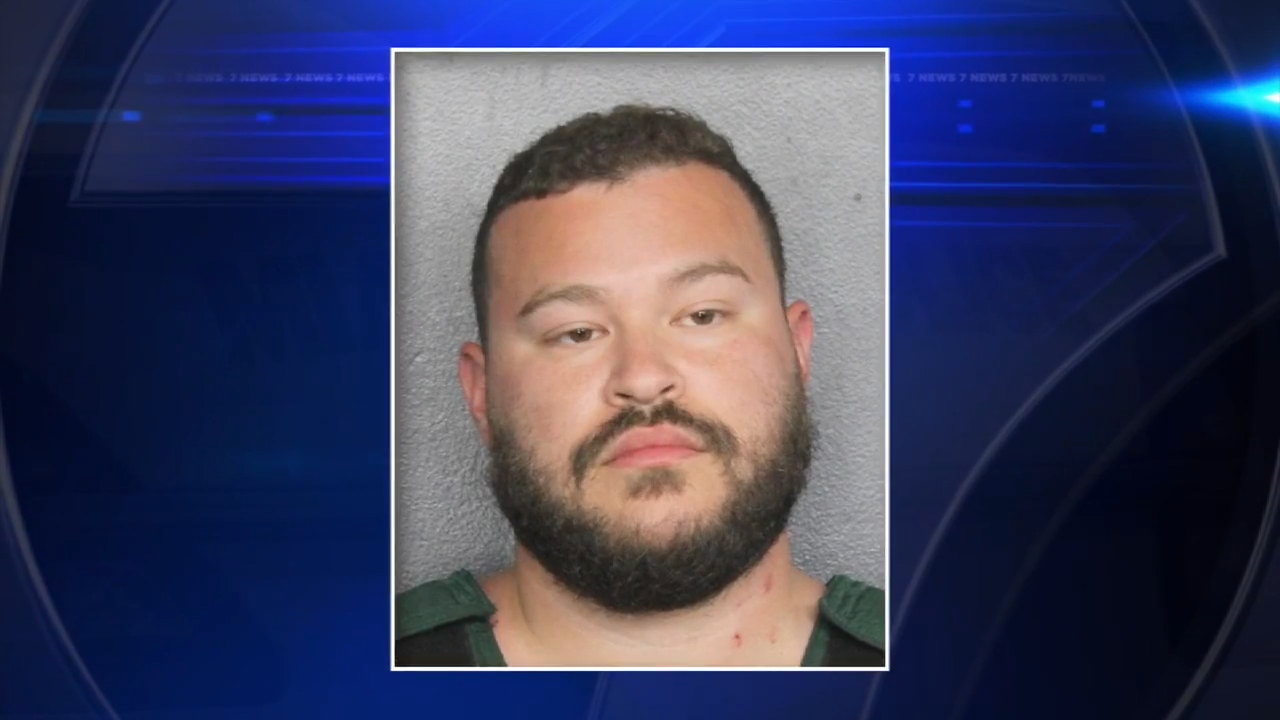 Miami Police officer arrested in Sunrise, relieved of duty with pay ...