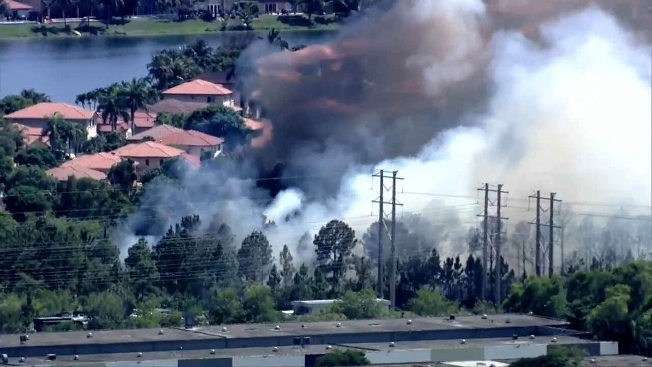 Brush fire in SW Miami-Dade continues burning; 16 acres burned; 95% ...