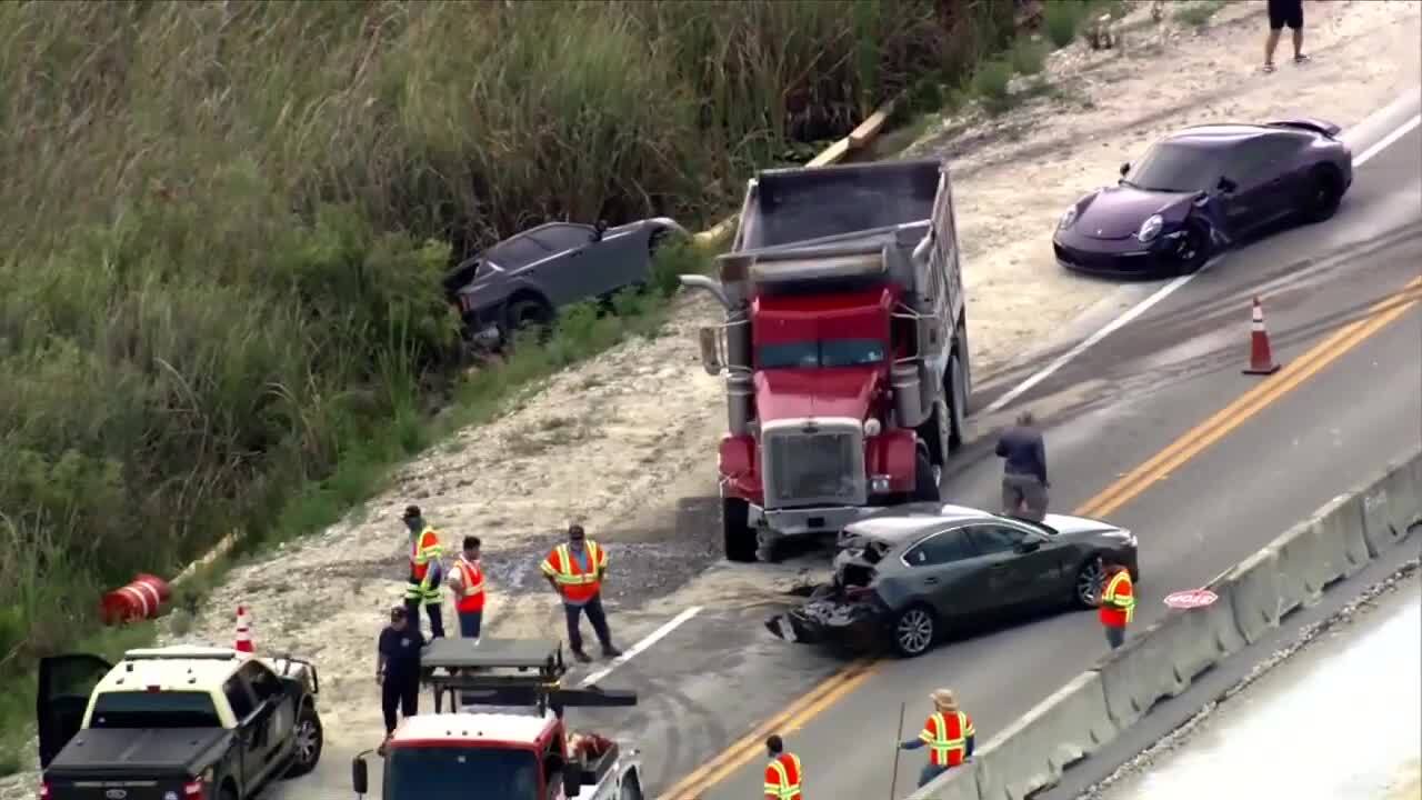 2 hospitalized after dump truck crashes with several cars on Tamiami ...