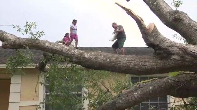Broward families clean up debris, survey damage after strong Friday ...