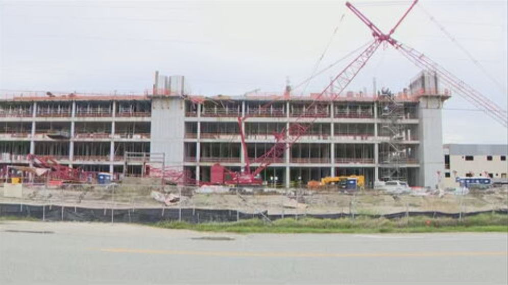 A crane collapses kills 2 at a Florida construction site, officials say ...