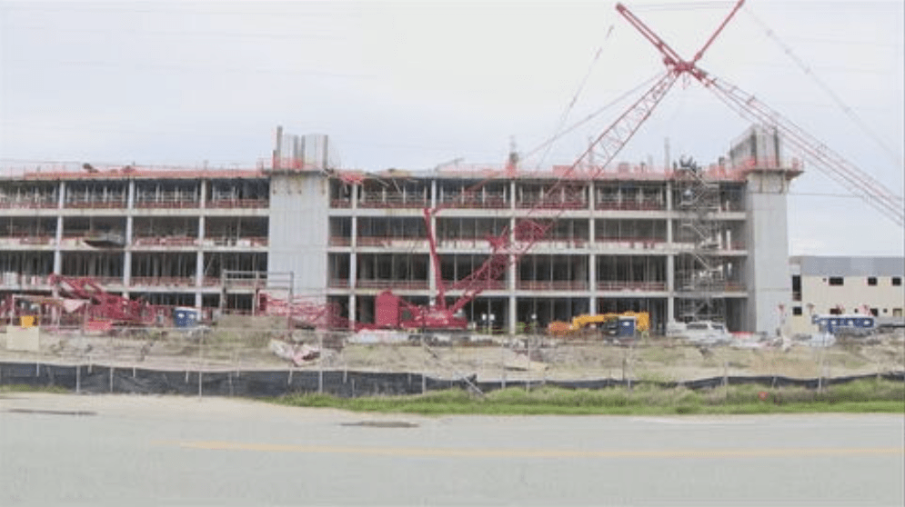 A crane collapses kills 2 at a Florida construction site, officials say ...