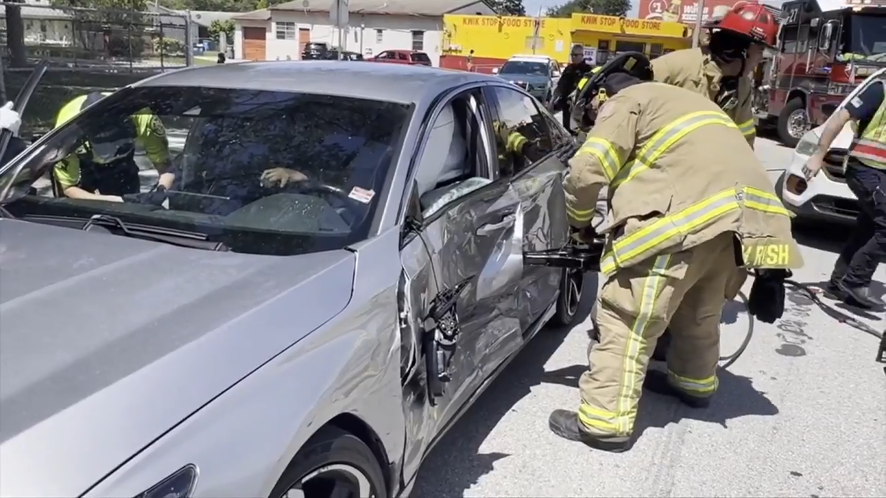 Crews rescue trapped man inside car in Pembroke Park after crash - WSVN 7News | Miami News ...