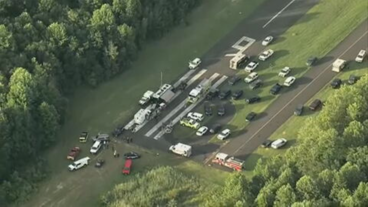 Skydiving plane goes off New Jersey runway and crashes into woods ...