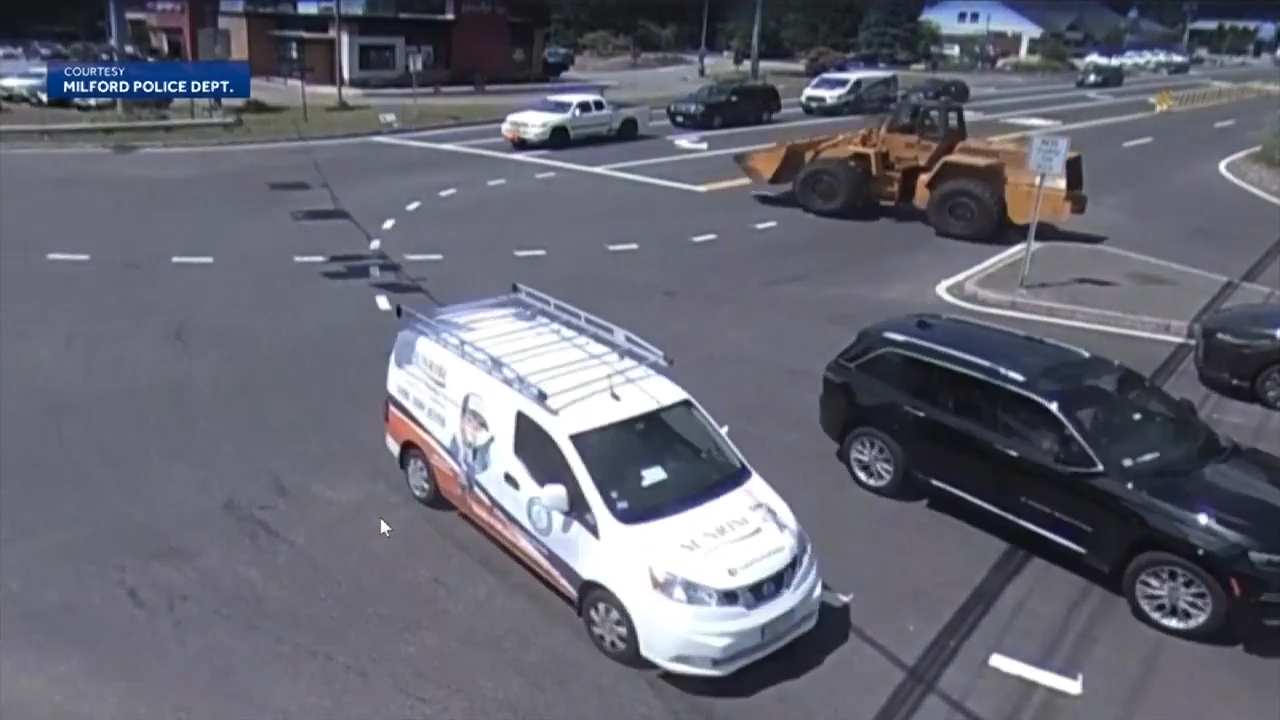 60,000-pound front end loader barrels down hill, crashes after brakes ...