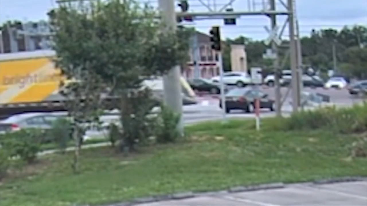 Video shows elderly driver going around crossing arms before being ...