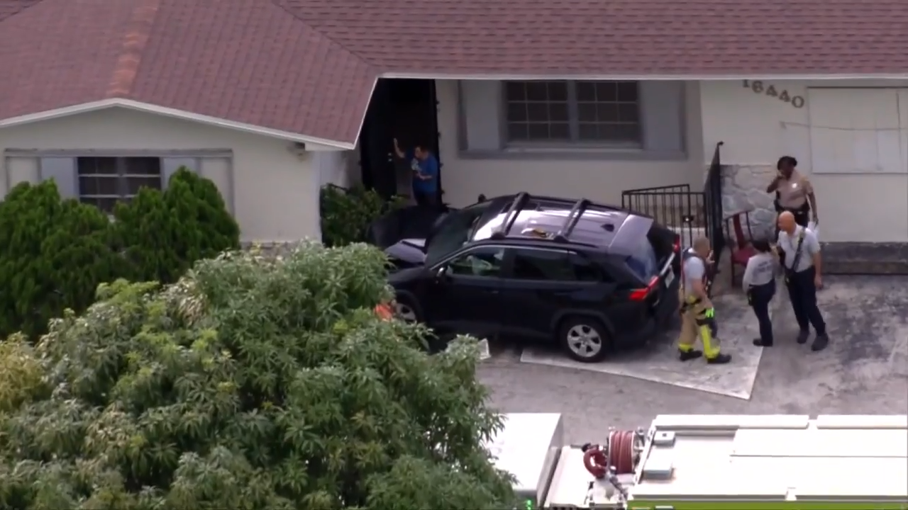 Woman hospitalized after crashing into North Miami-Dade home - WSVN ...