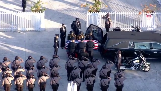 Procession for MDSO Deputy Devin Jaramillo heads to loanDepot Park for ...