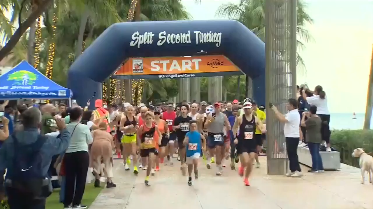 Over 1,000 runners take part in AvMed Orange Bowl Beach Run in South ...